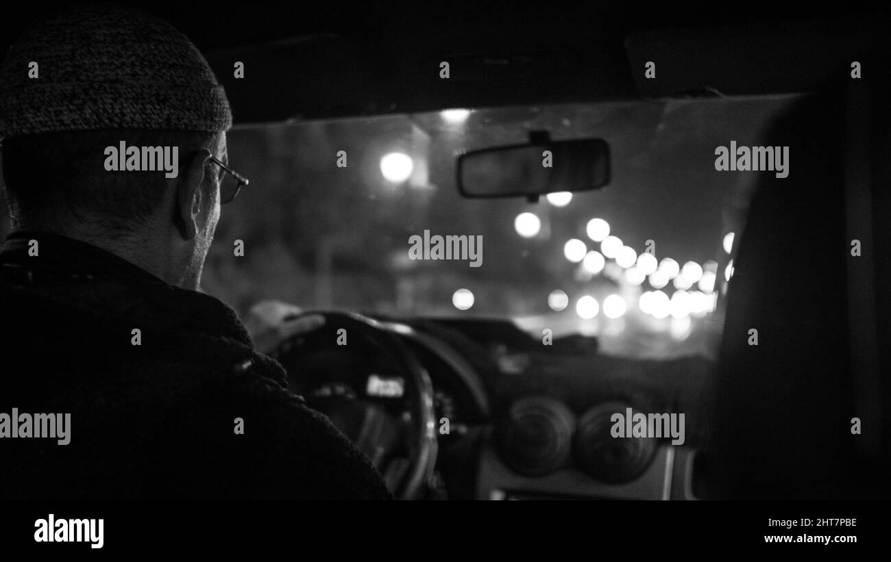 Taxi driver rear view Black and White Stock Photos & Images - Alamy
