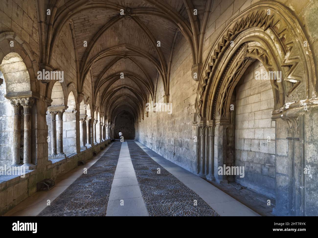 Beautiful ancient hallway with arches Stock Photo - Alamy