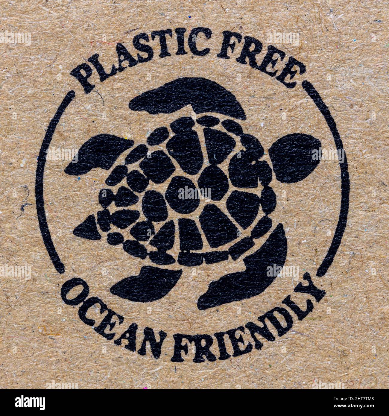 Recycling logo on cardboard packaging Stock Photo - Alamy