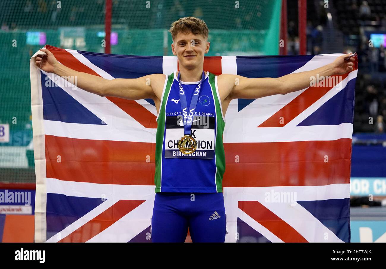 Ben Higgins celebrates with the gold medal after winning the Men's 400 ...