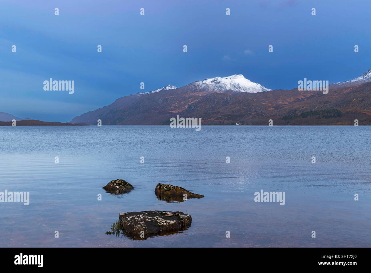 LOCH MAREE KINLOCHEWE SCOTLAND SNOW ON THE HILLS AND LOOKING ACROSS TO ...