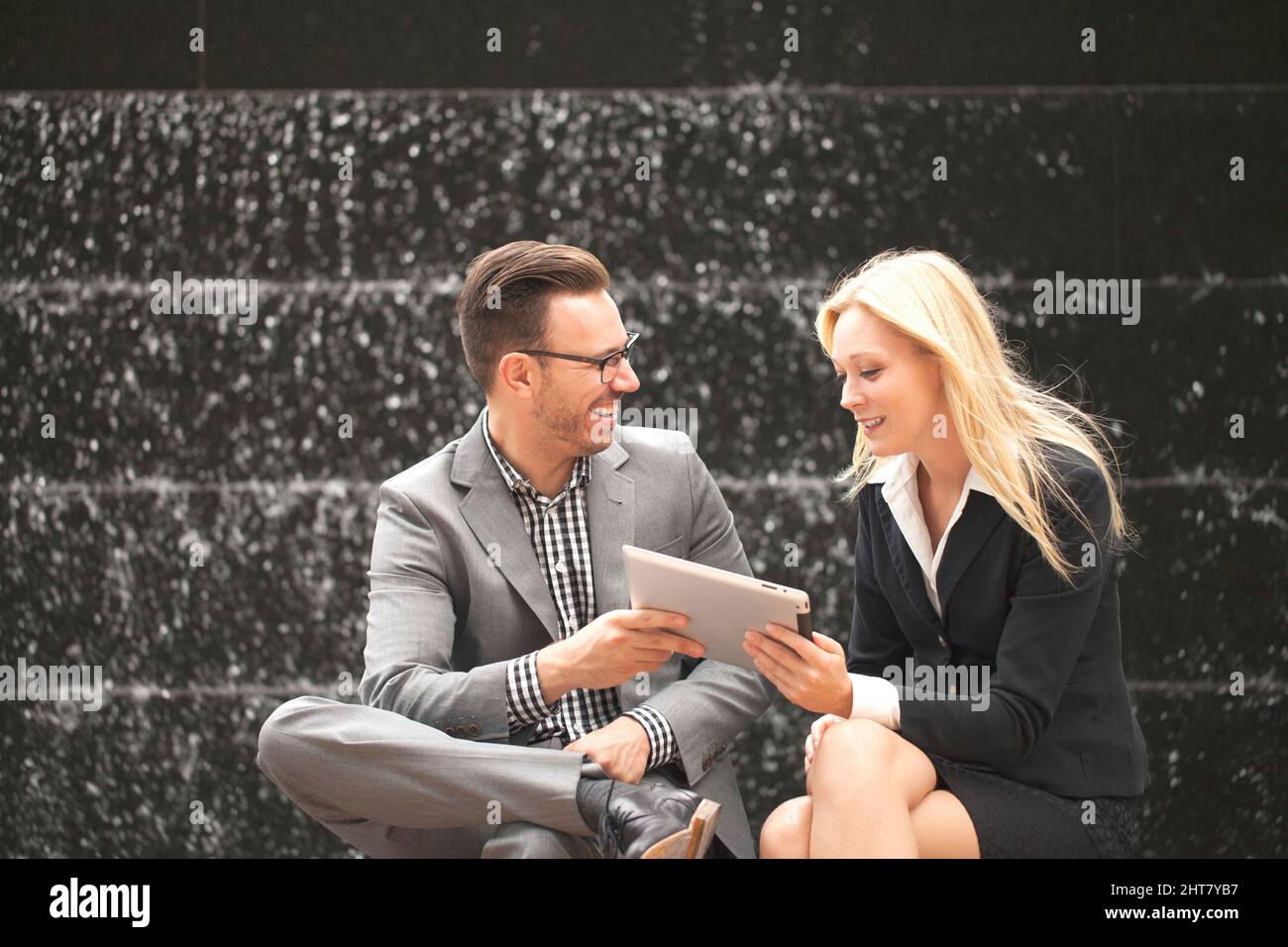 Sitting down together hi-res stock photography and images - Alamy