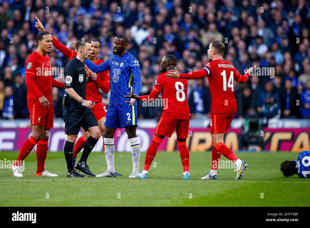 London, UK. 27th Feb, 2022. Players remonstate with referee Stuart ...
