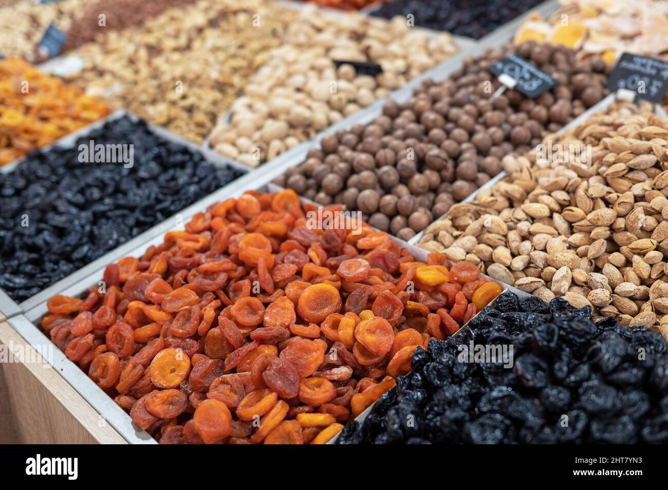 Dried fruits and nuts on local food market Stock Photo - Alamy