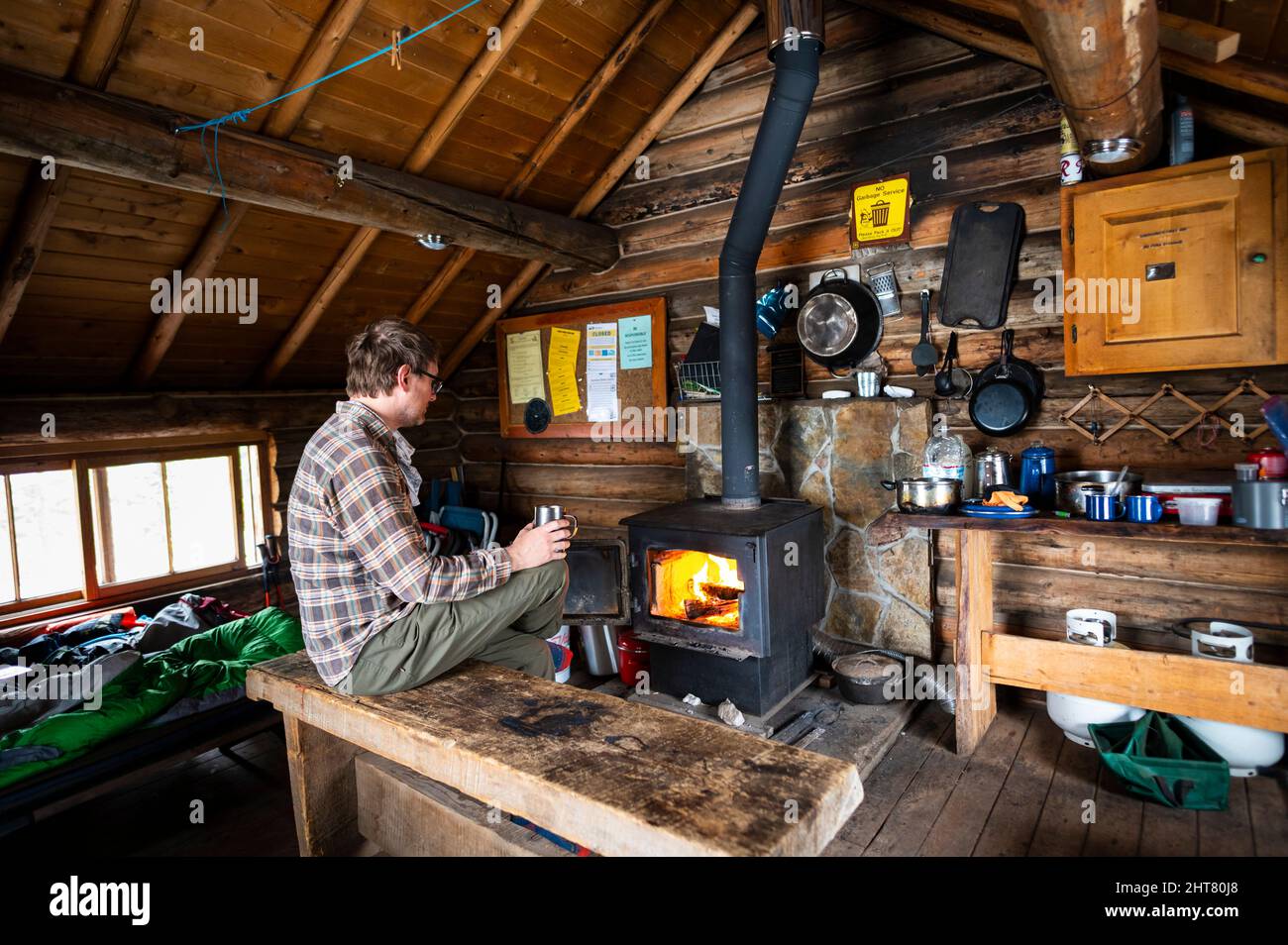 Drinking coffee with a fire inside the Snow Peak Cabin Stock Photo - Alamy
