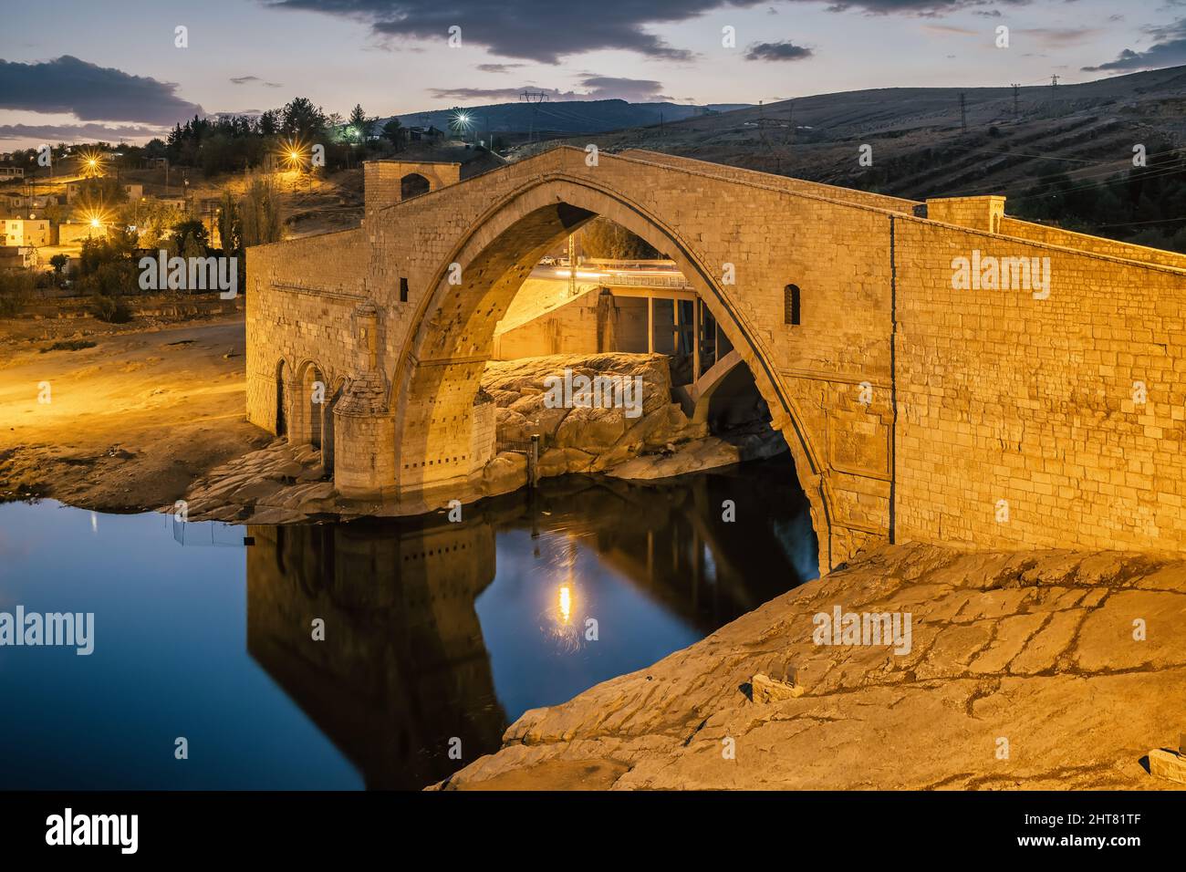 Historic Malabadi Bridge on the Batman river at twilight, Turkey Stock ...