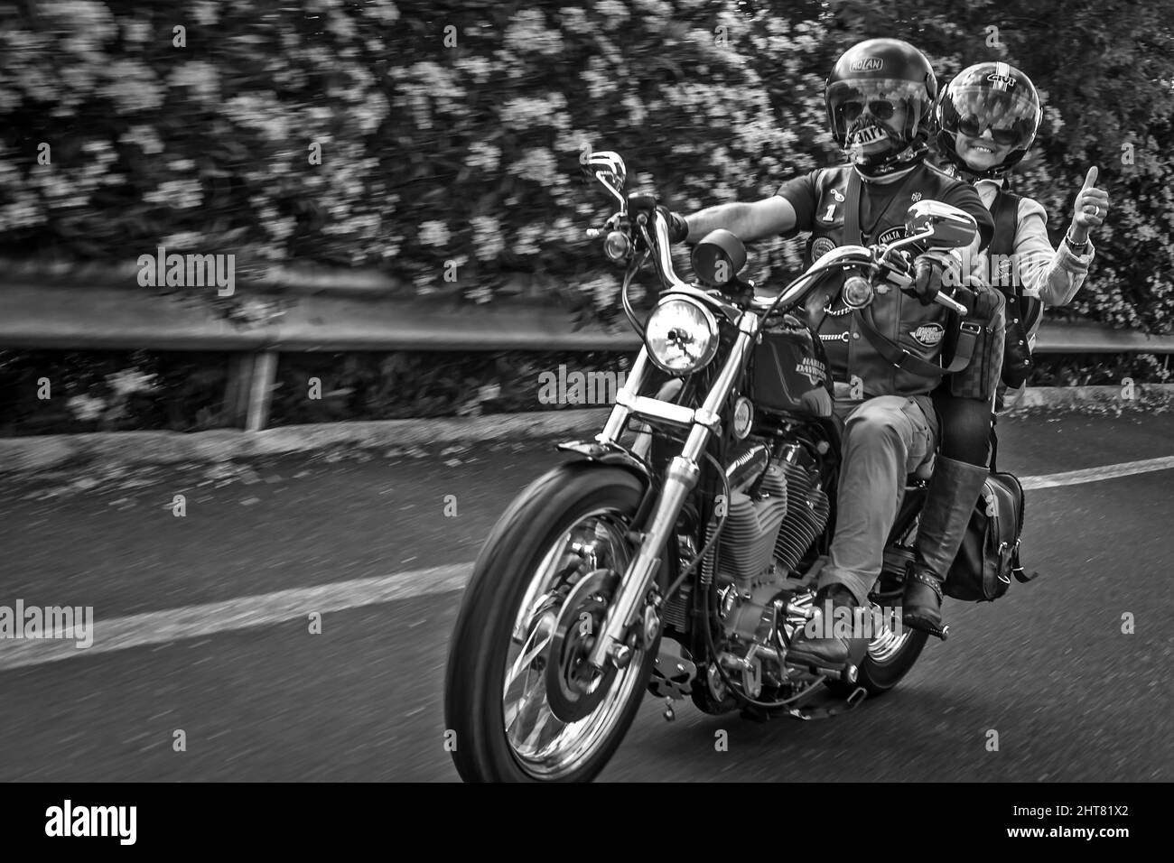 Biker riding motorcycle Black and White Stock Photos & Images - Alamy