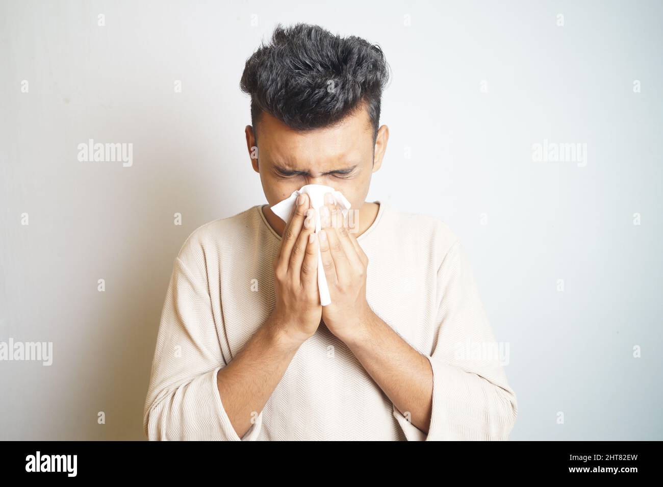 Indian man sneezing hi-res stock photography and images - Alamy