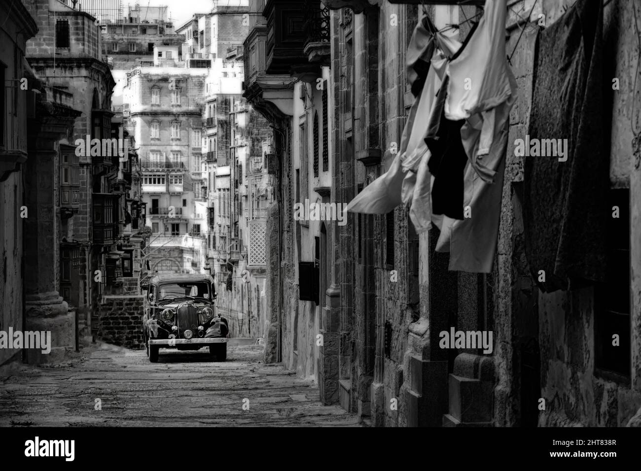 An Old Nostalgic Scene from a Street in Valletta Stock Photo - Alamy