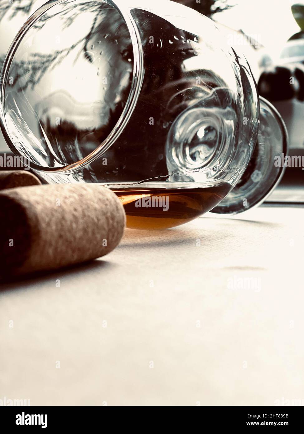 a glass of alcohol lies on its side Stock Photo - Alamy