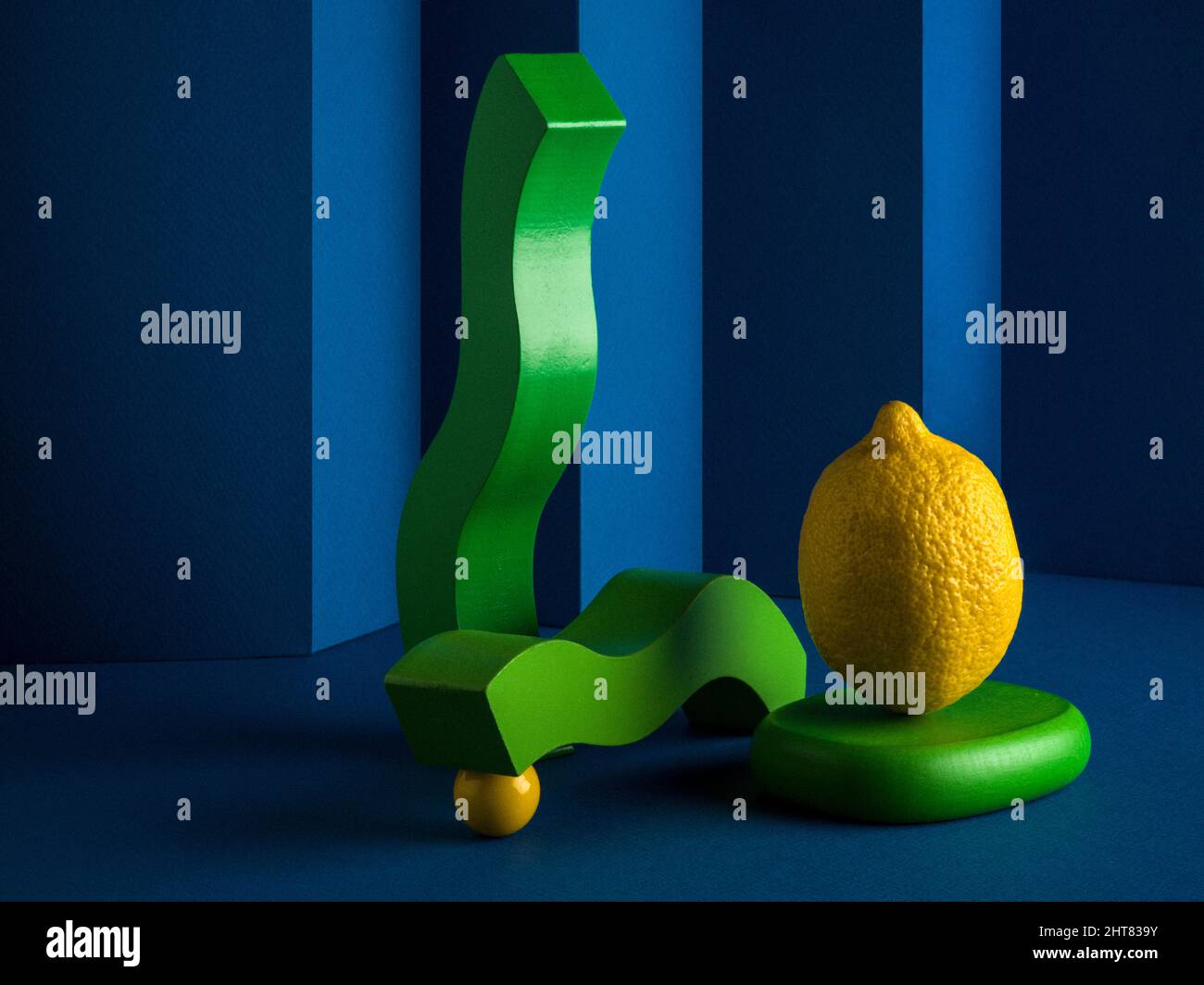 Abstract still life with lemon and shapes Stock Photo - Alamy