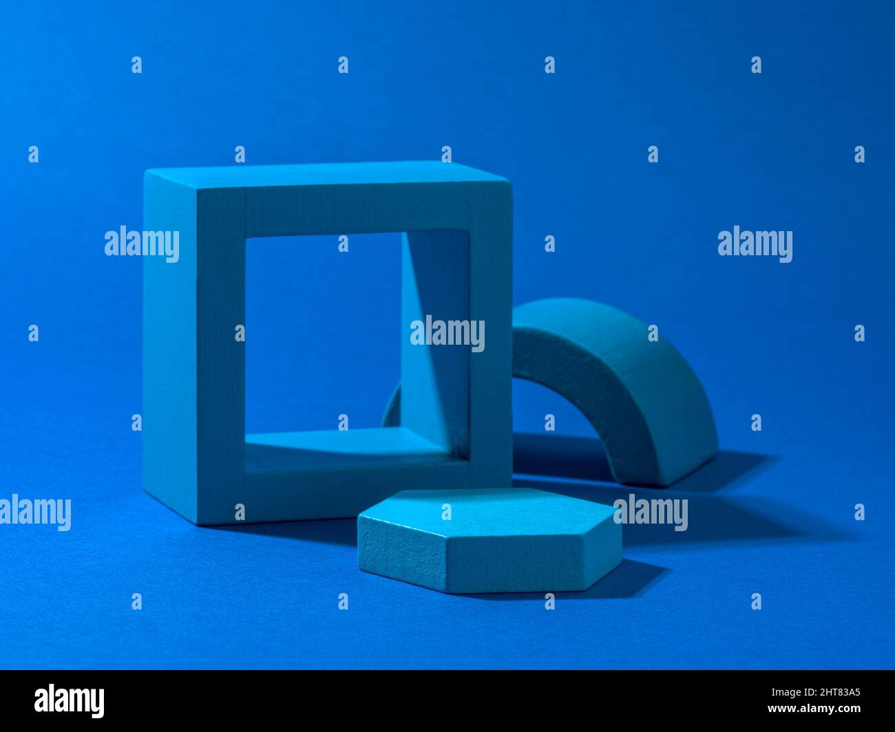 Blue shapes over blue background Stock Photo - Alamy