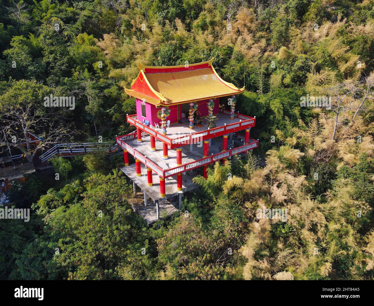 Distant view of the Wet Ban Tham Buddhist Temple surrounded by the ...