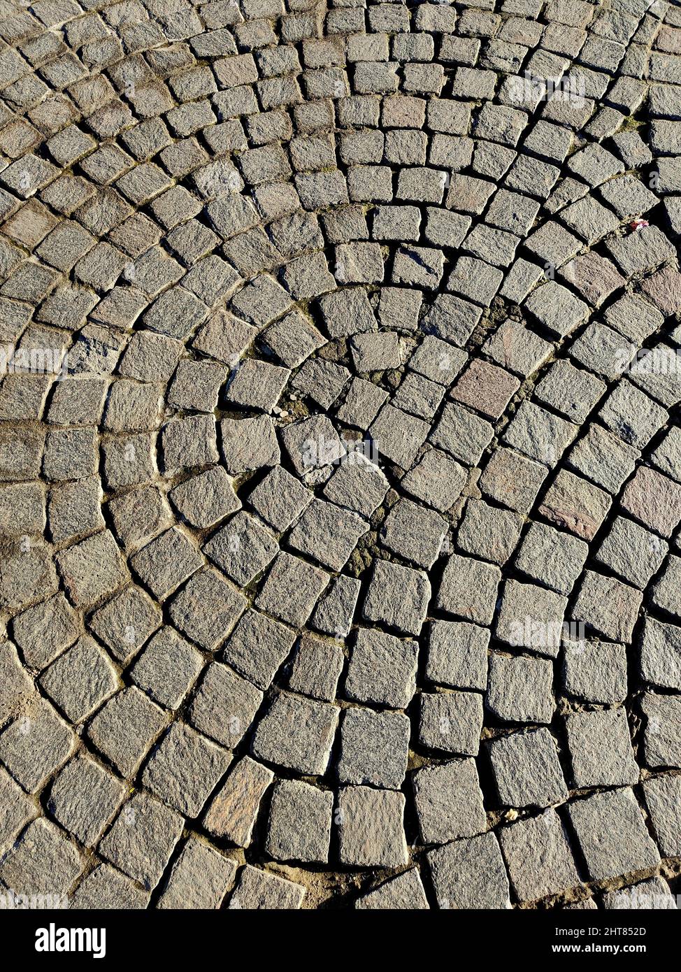 Vertical closeup of the gray cobblestone ground Stock Photo - Alamy