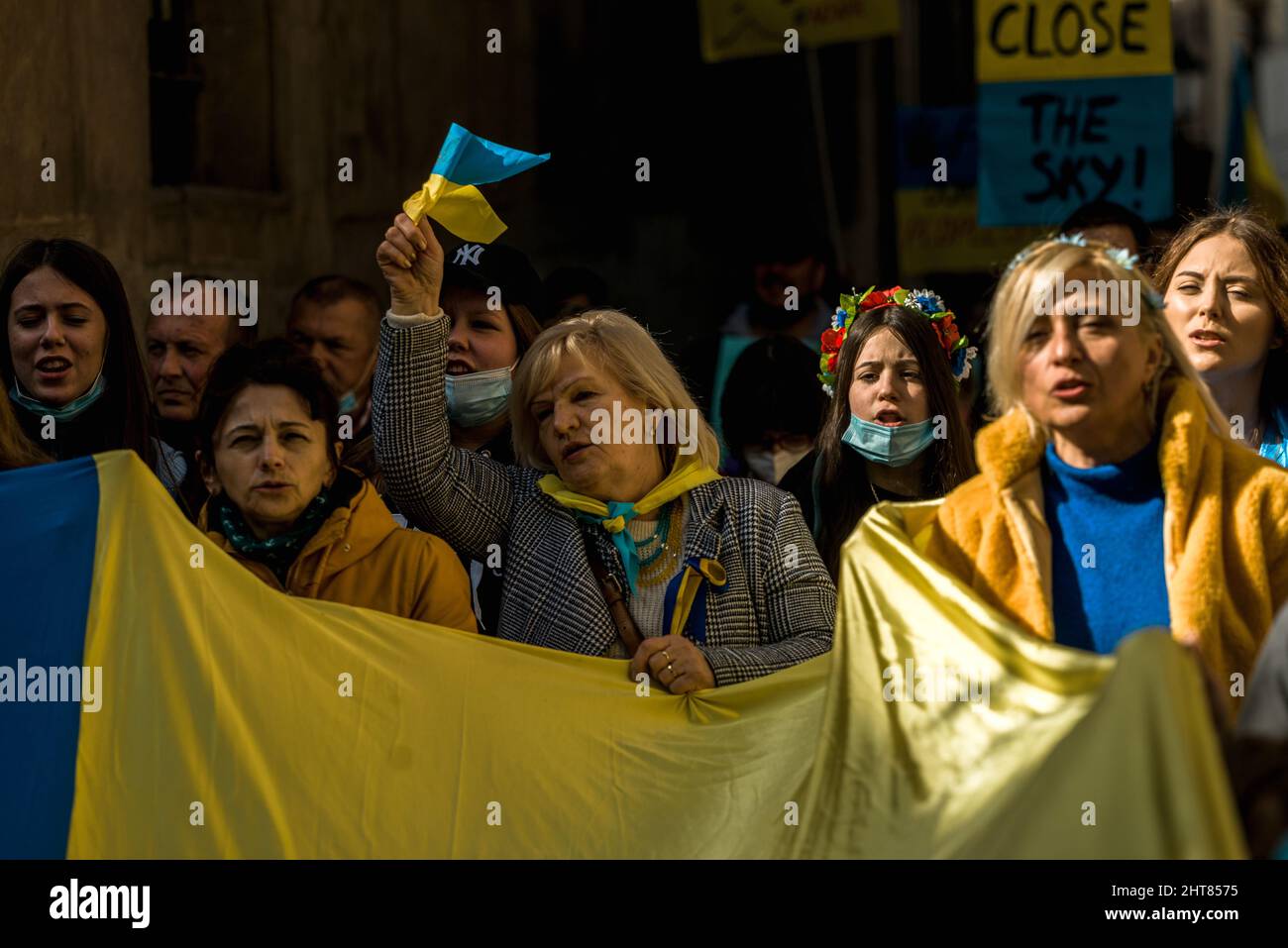 Barcelona, Spain. 27th Feb, 2022. Pro-Ukrainian protestors behind a ...