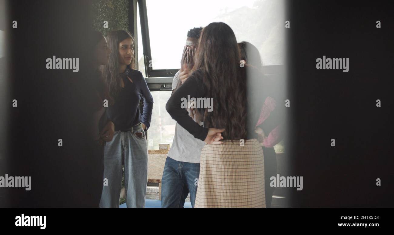 Shallow focus of a group of Indian young people having fun during an ...