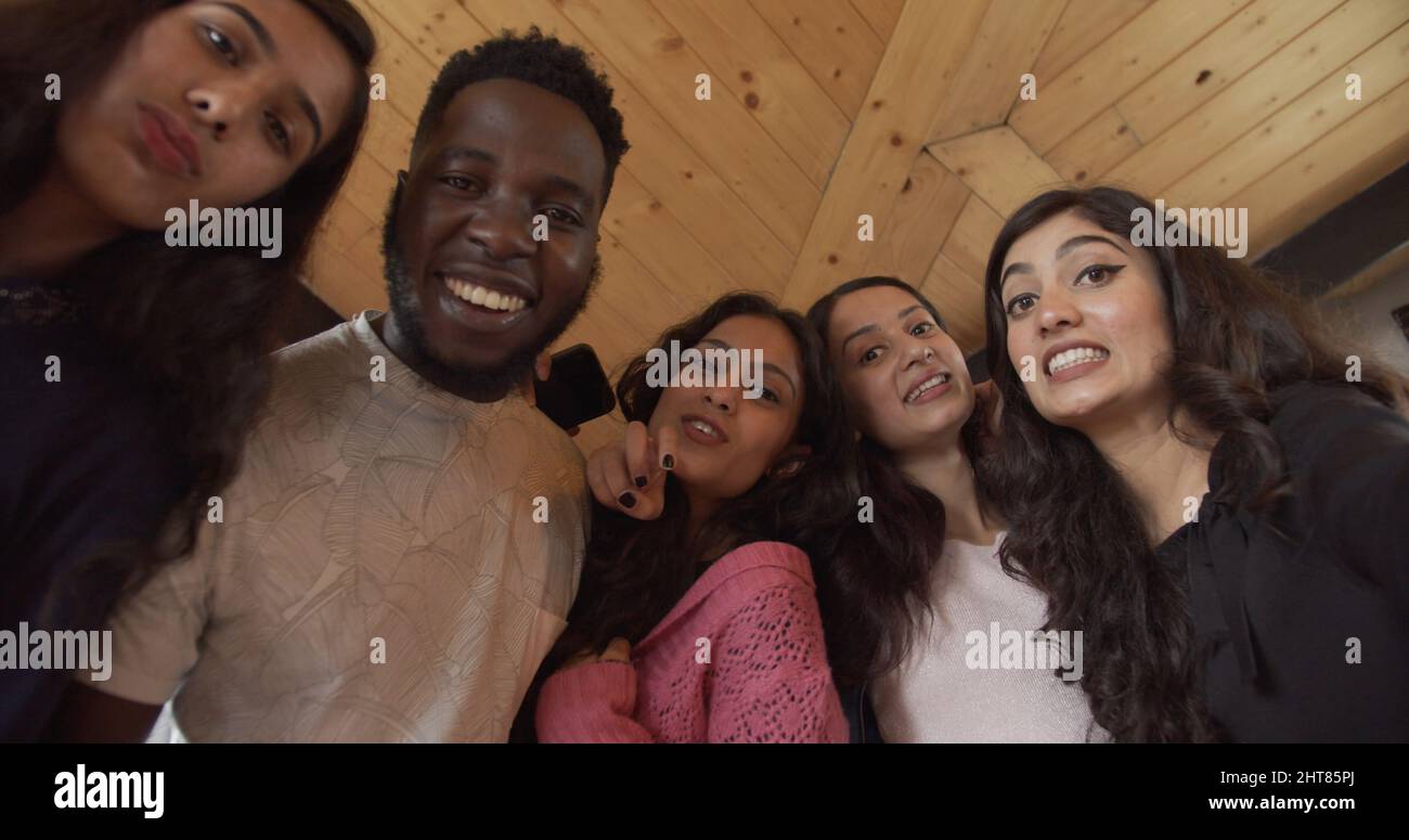 Group of young happy smiling friends taking a selfie together Stock ...