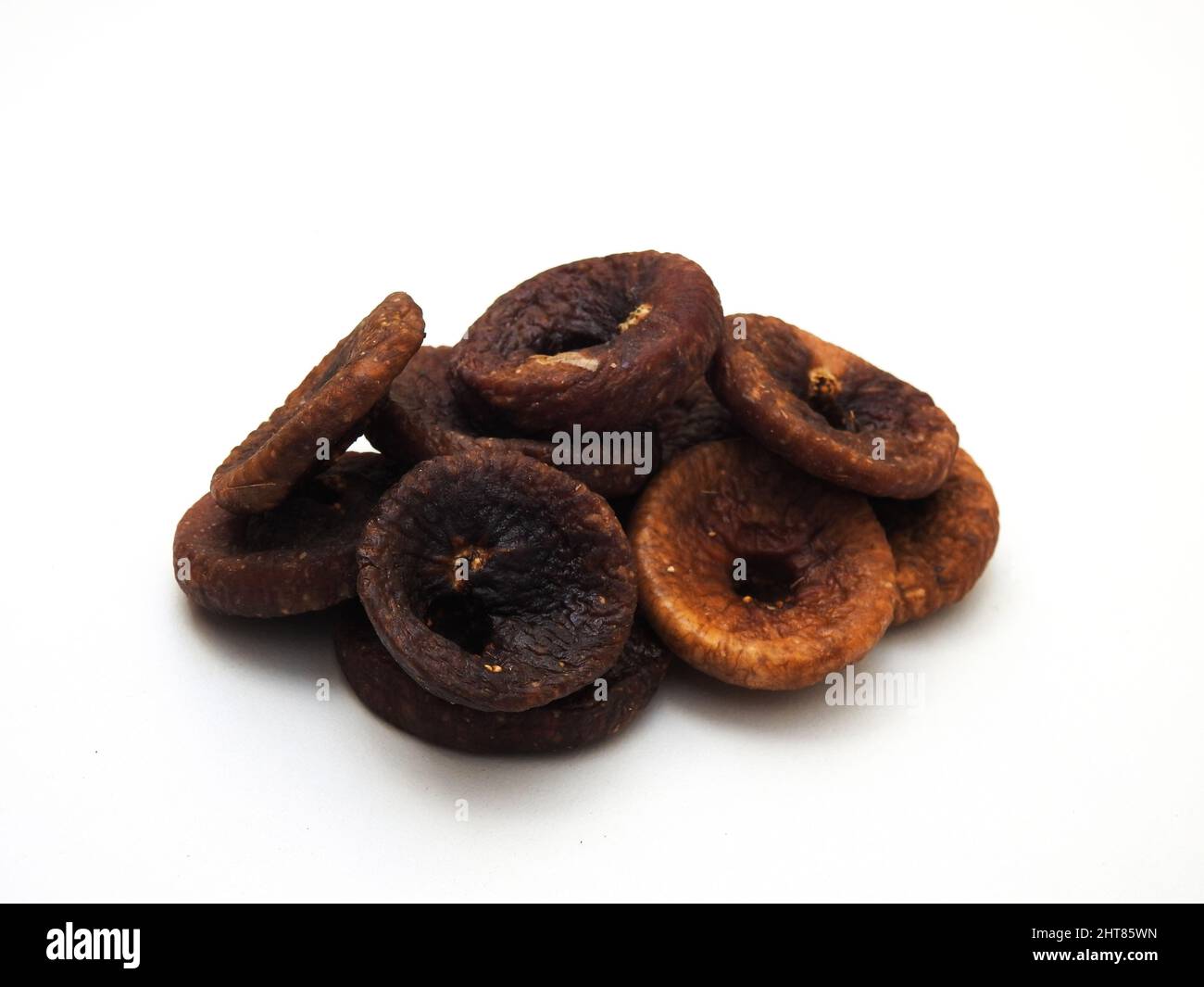 Closeup of sweet dry fig fruit isolated white background Stock Photo ...