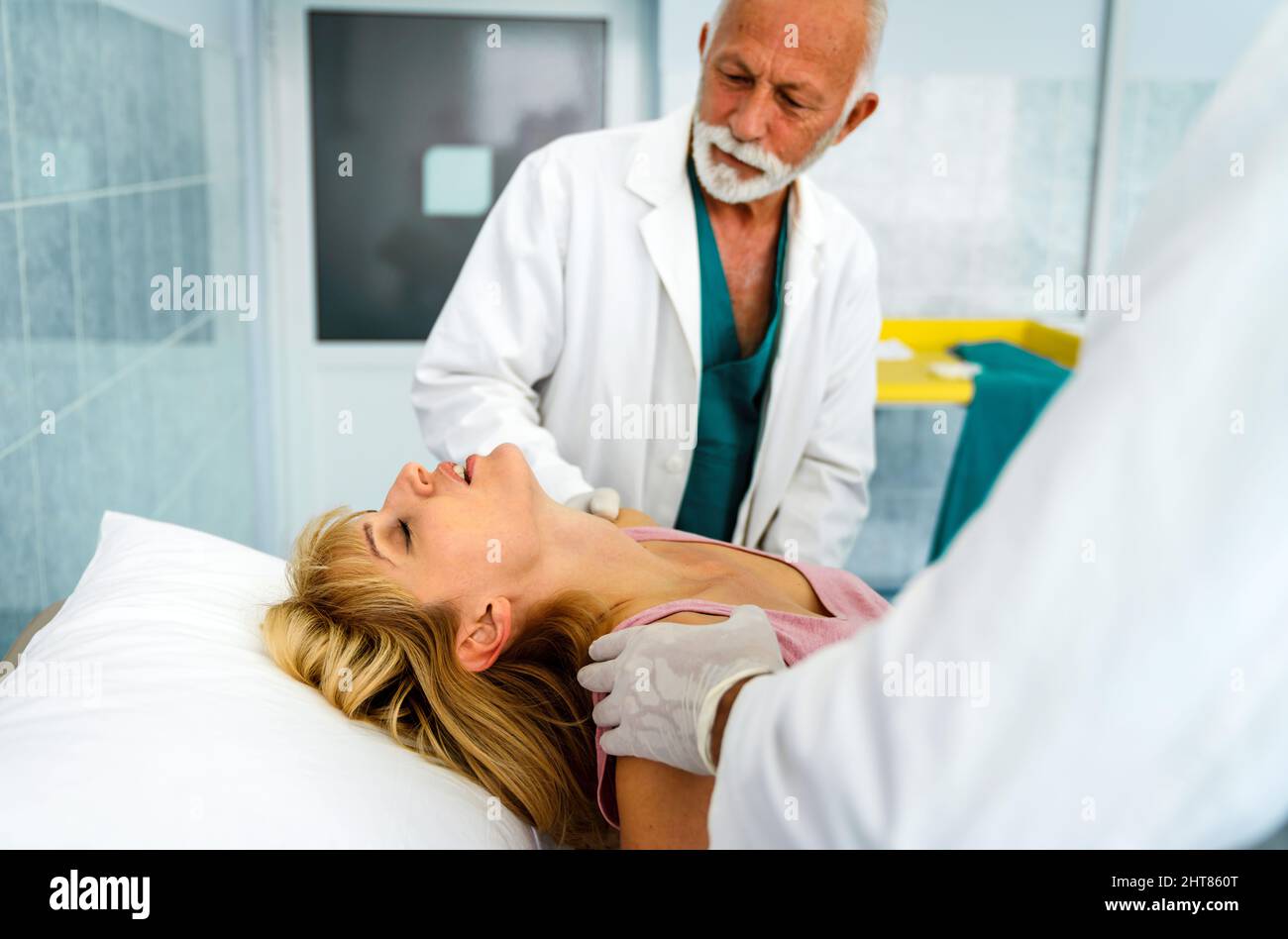 Pregnant woman pushes to give birth in hospital, obstetrician doctor ...