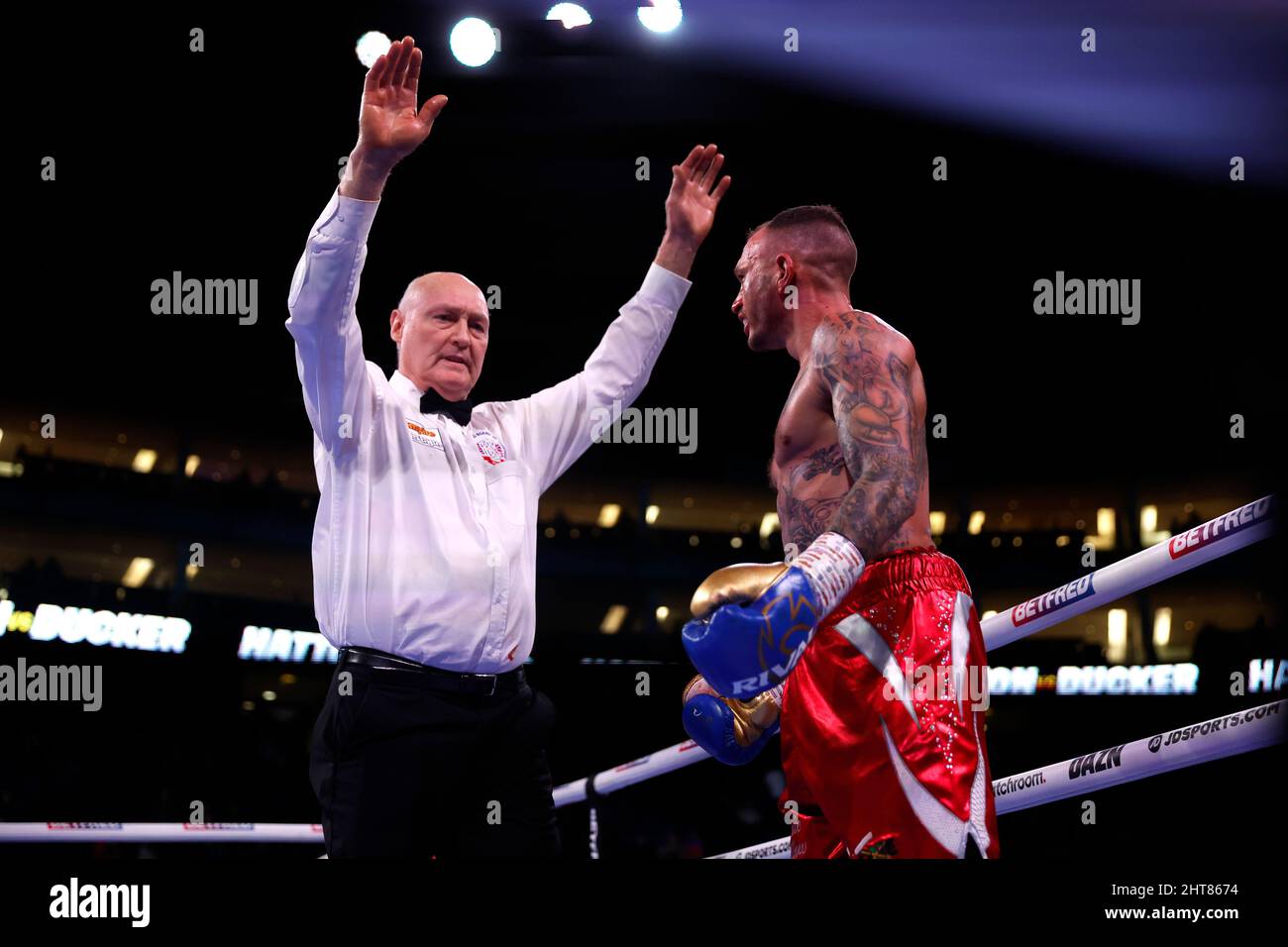 The referee stops Joe Ducker during his fight against Campbell Hatton ...