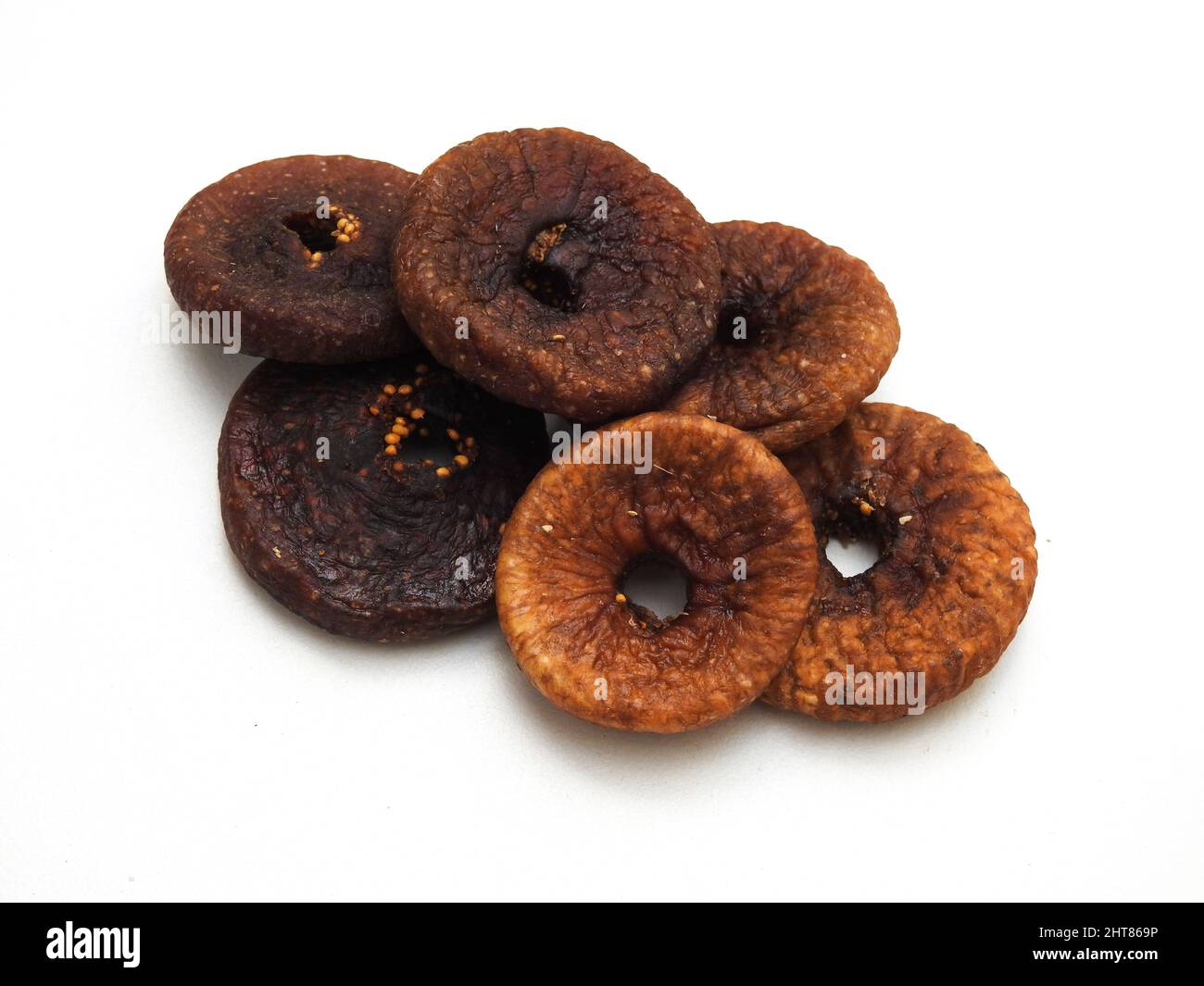 Closeup of sweet dried fig fruits isolated on a white background Stock ...