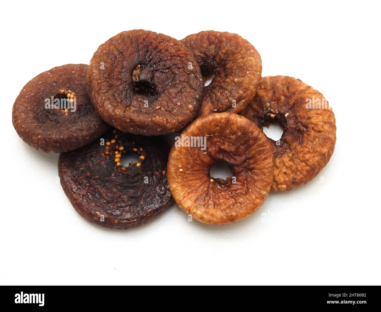 Closeup of sweet dry fig fruit isolated white background Stock Photo ...