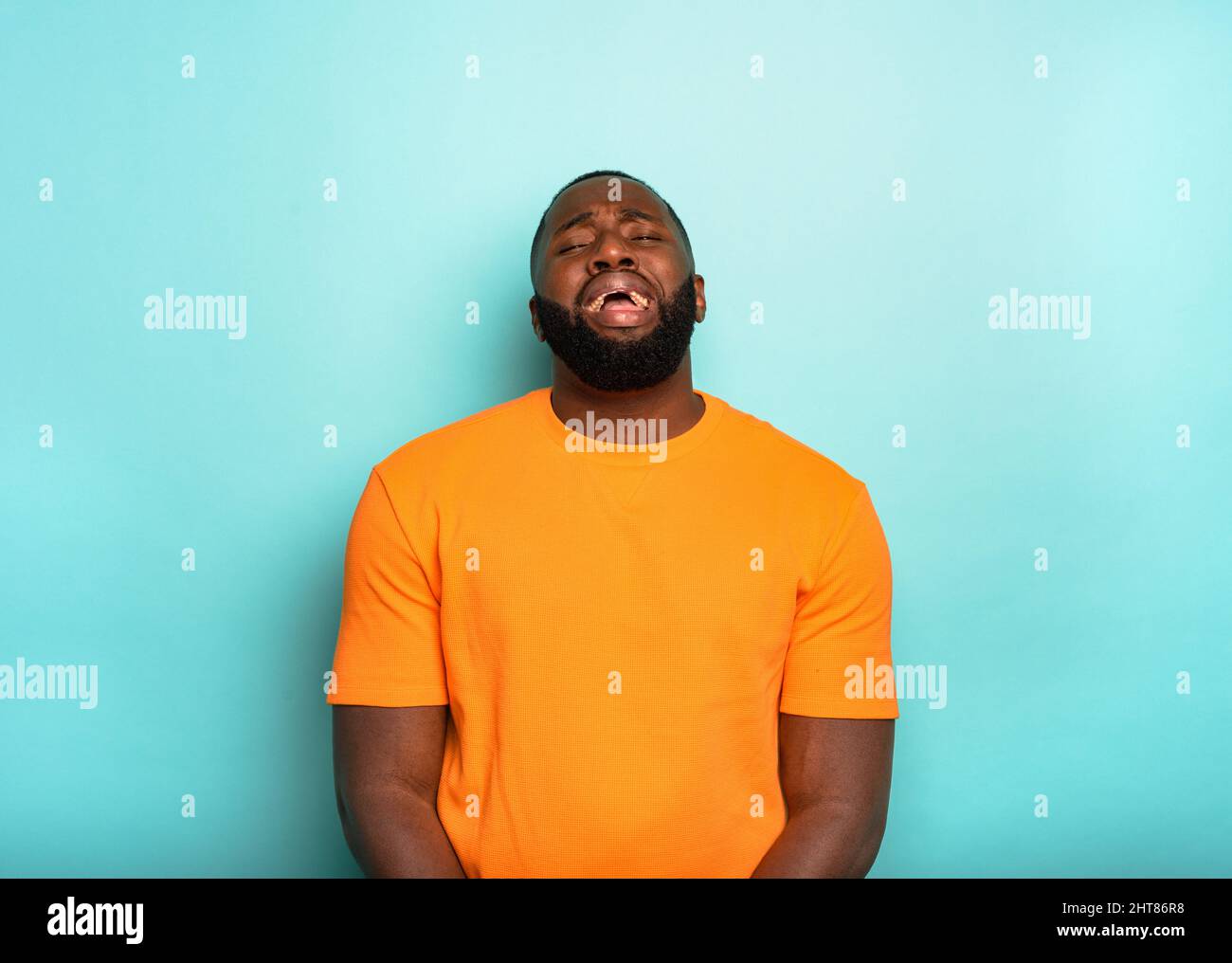 Black man crying hi-res stock photography and images - Alamy