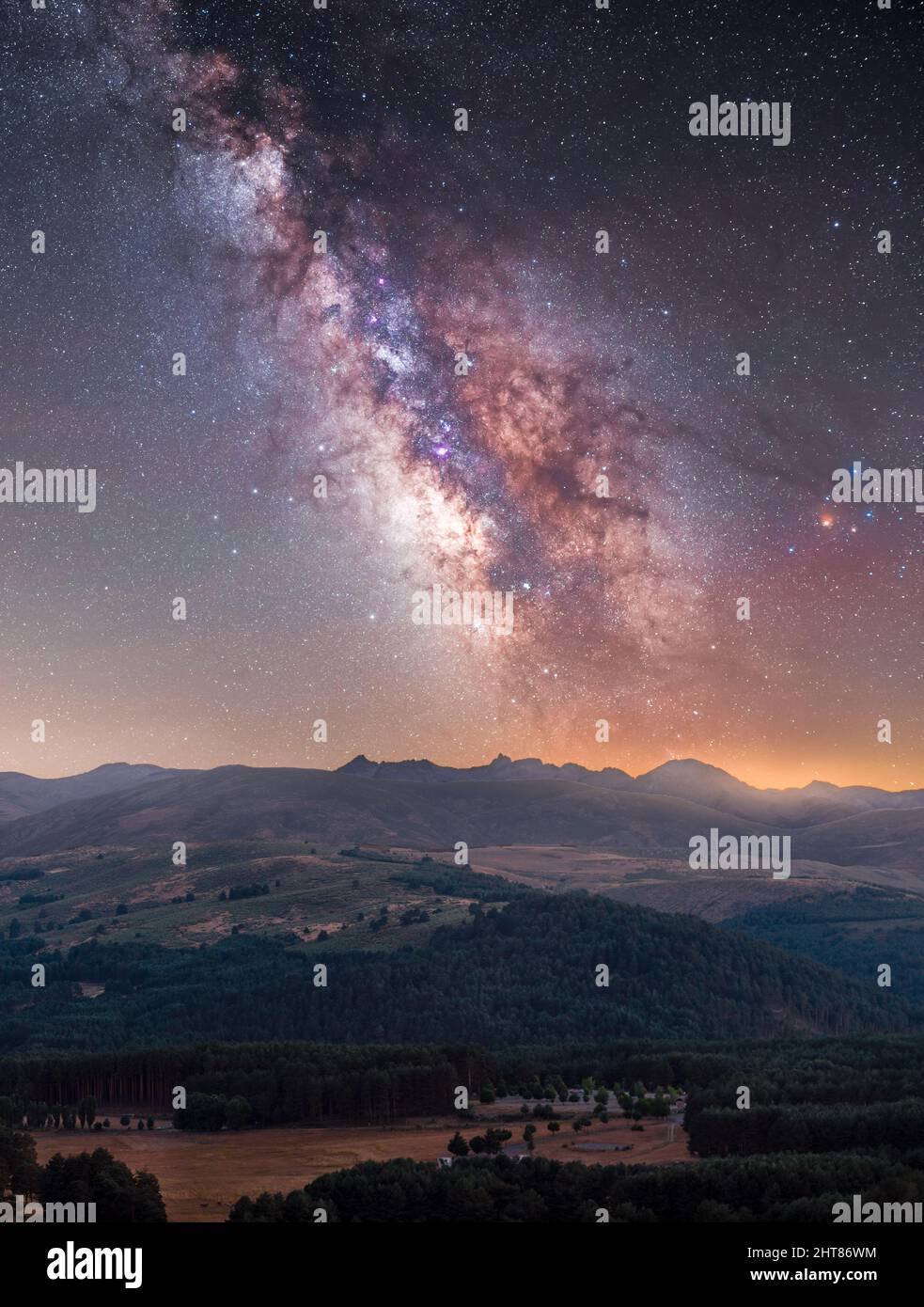 Vertical shot of a milky way galaxy sky over mountains in Gredos, Avila ...
