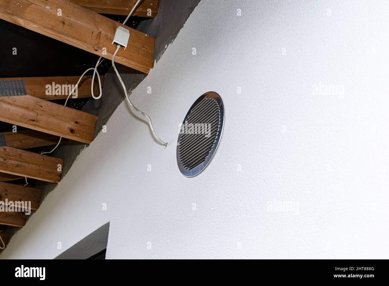 Air intake and exhaust in the wall of a single family house for ...