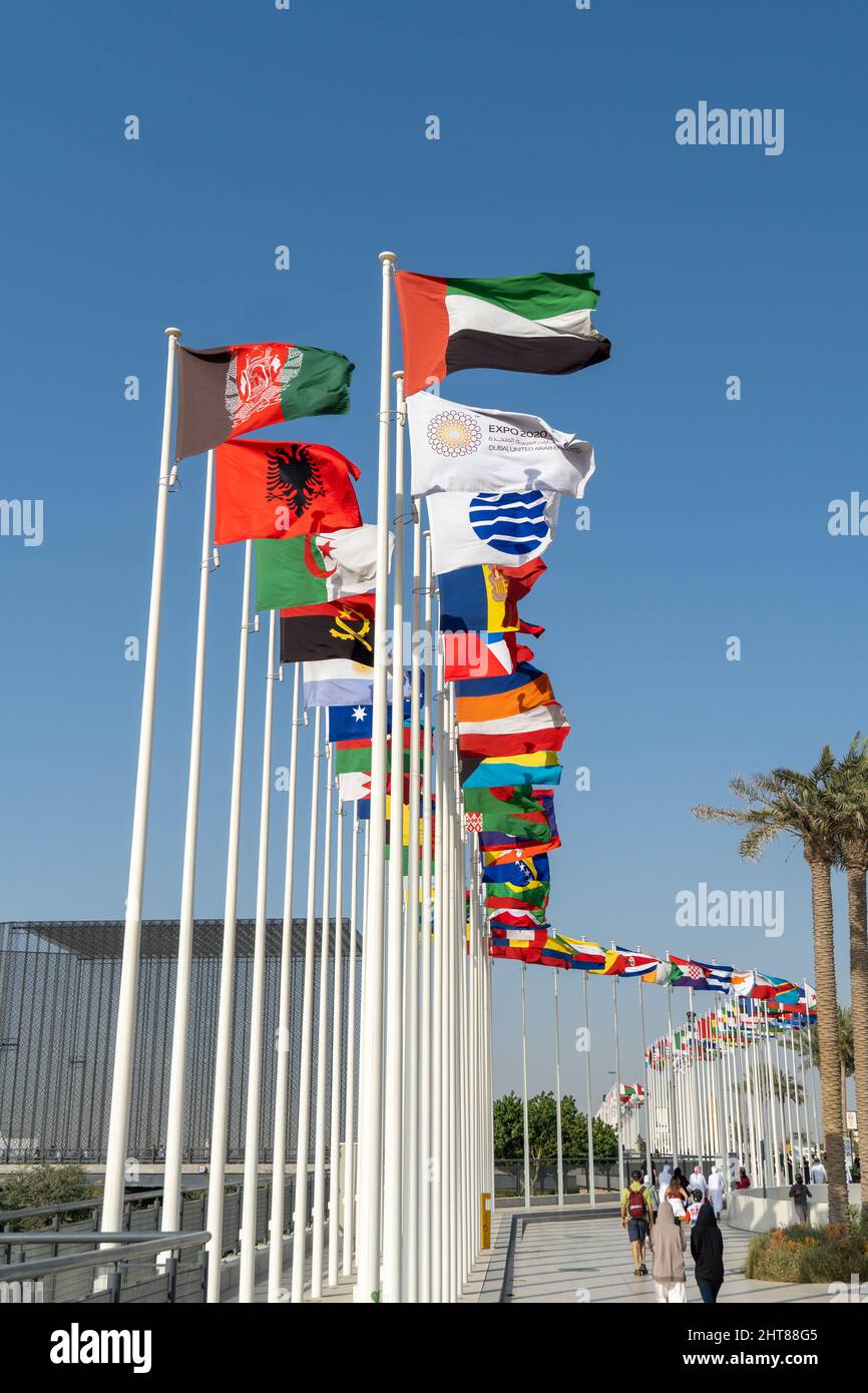 Many world flags flying in a row outside of expo center in 2020 waving ...