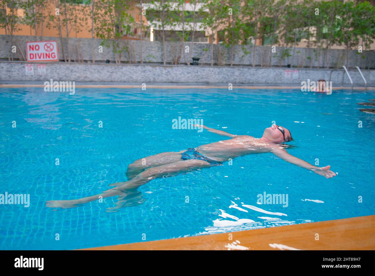 Man back swimmer swimming hi-res stock photography and images - Alamy
