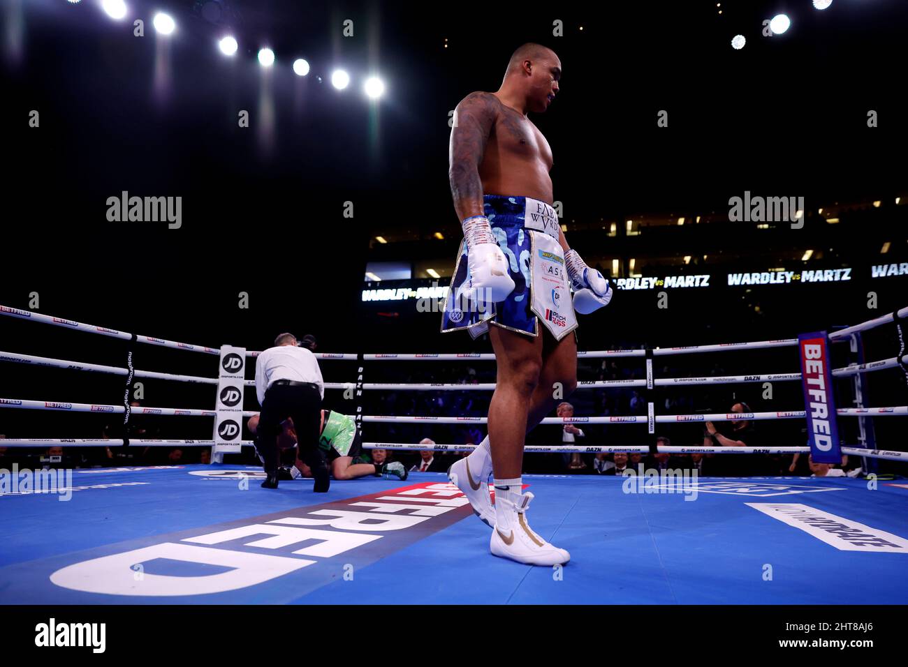 Fabio Wardley (left) after knocking down Daniel Martz during their ...