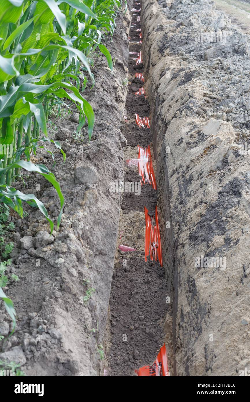 Narrow trench hi-res stock photography and images - Alamy