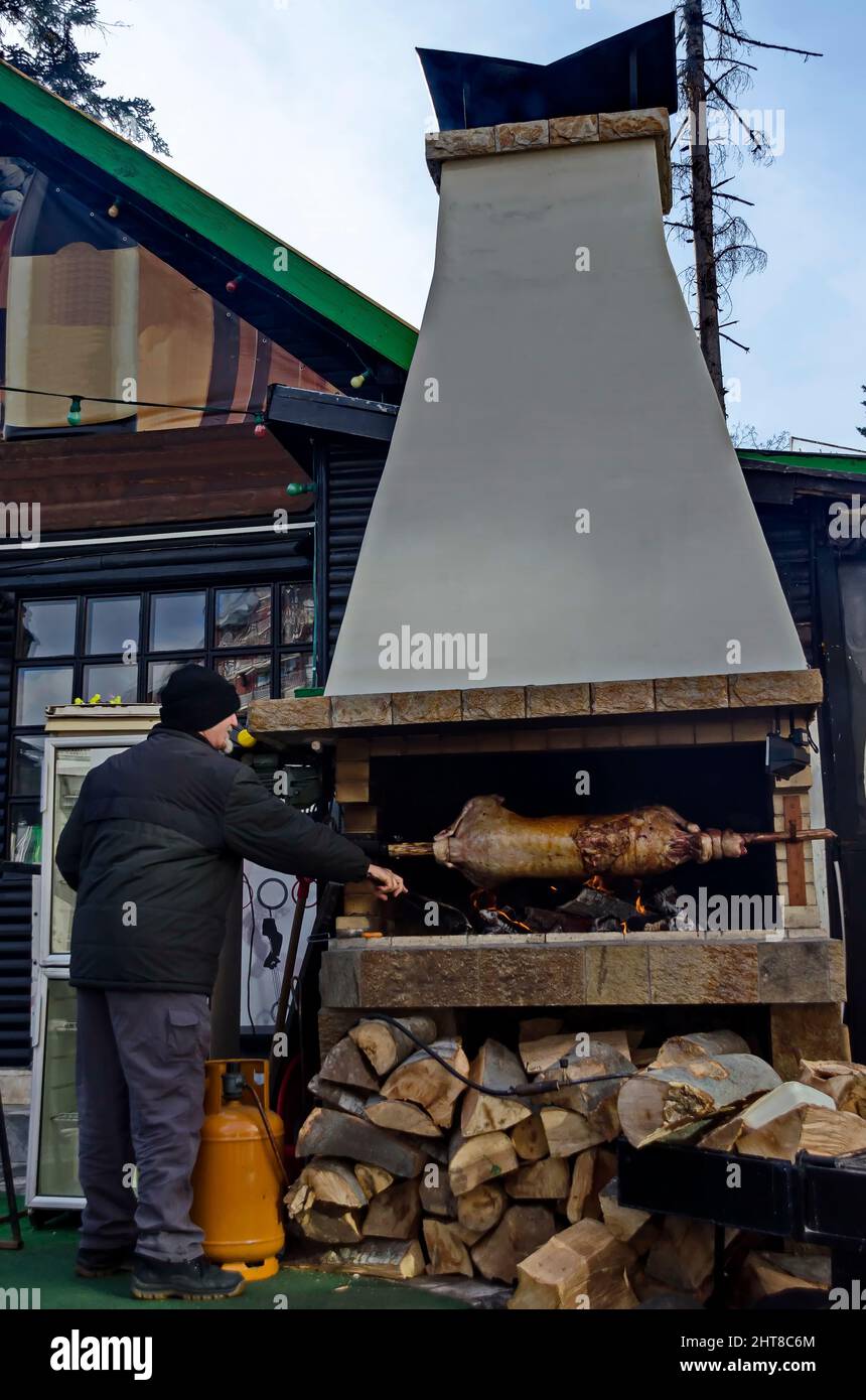 Spit roasted mutton cooking on open fire hi-res stock photography and ...