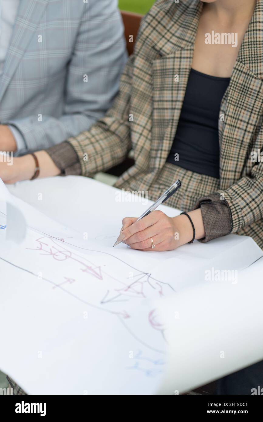Business people making the blueprints for the company Stock Photo - Alamy