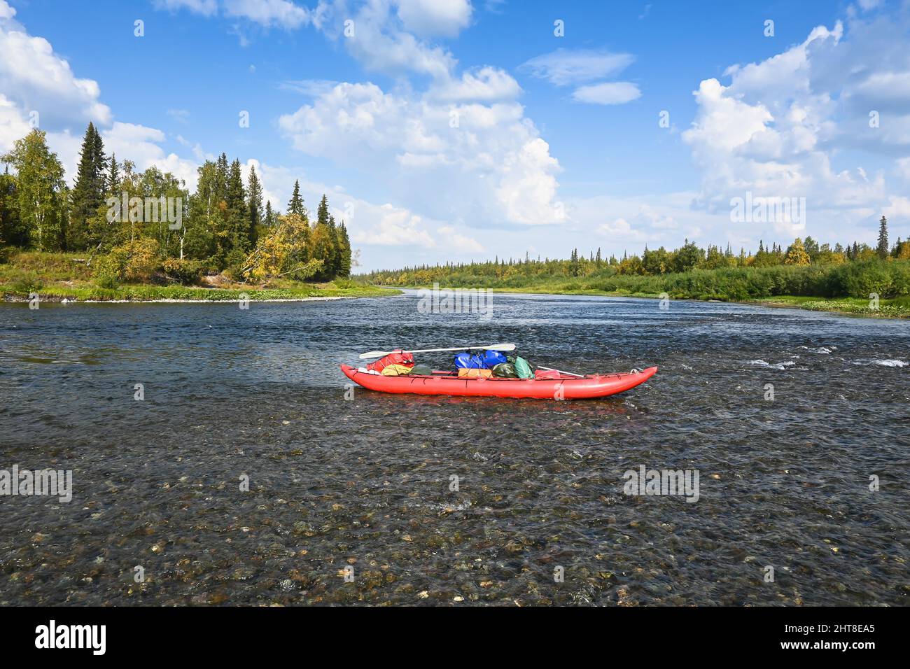 Boat trip in the Northern Urals. Summer river landscape with inflatable ...
