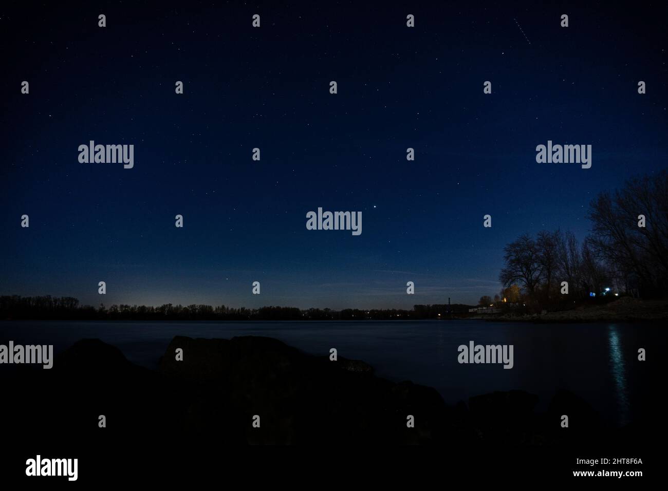 nightsky with stars over river Stock Photo - Alamy