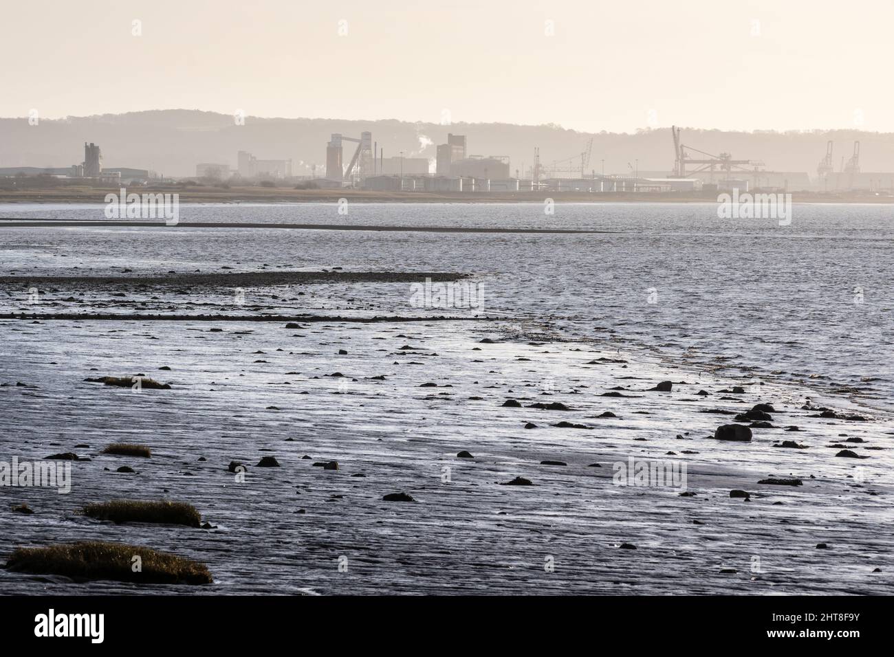 Cranes, silos and warehouses form the industrial landscape of Avonmouth ...