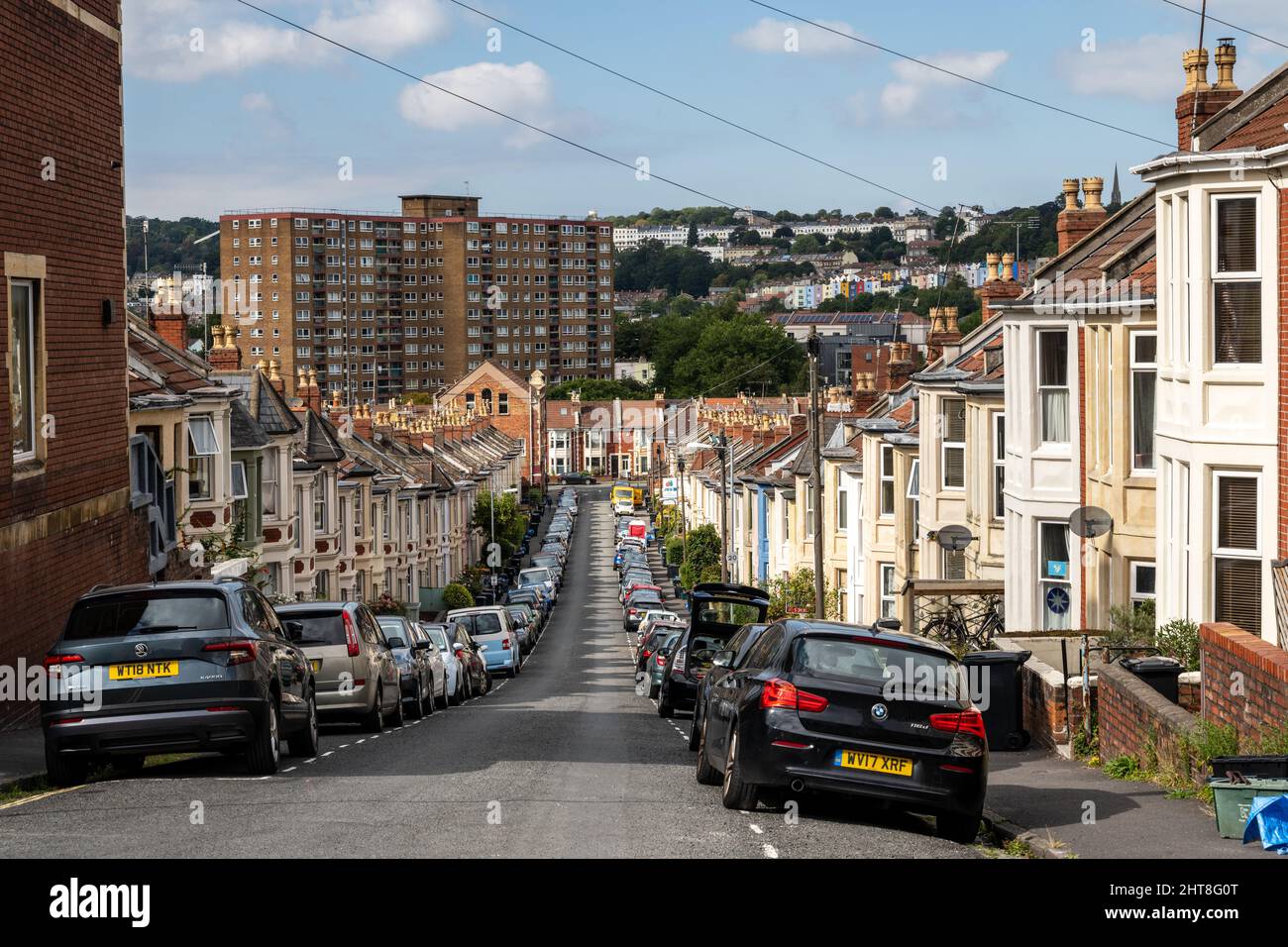 A 20th century high rise block of council flats rises above the low ...