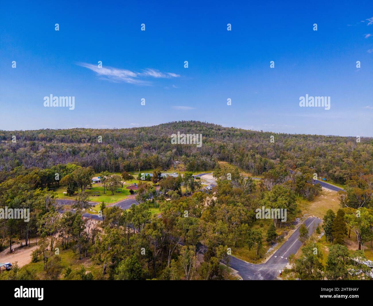 Aerial view of hills with a highway going between them near Copeton Dam ...