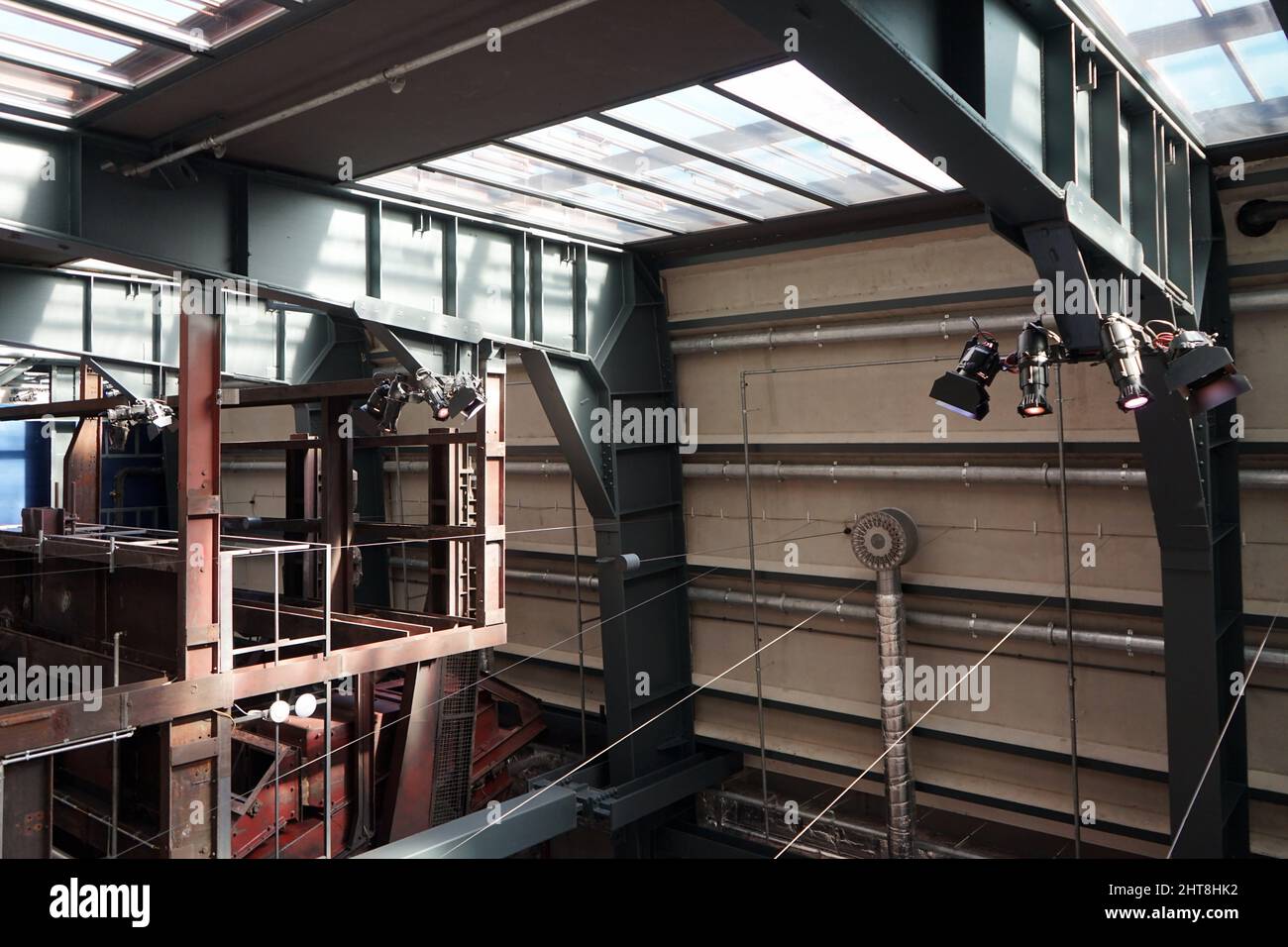 Old factory interior with glass ceiling and metal columns Stock Photo ...