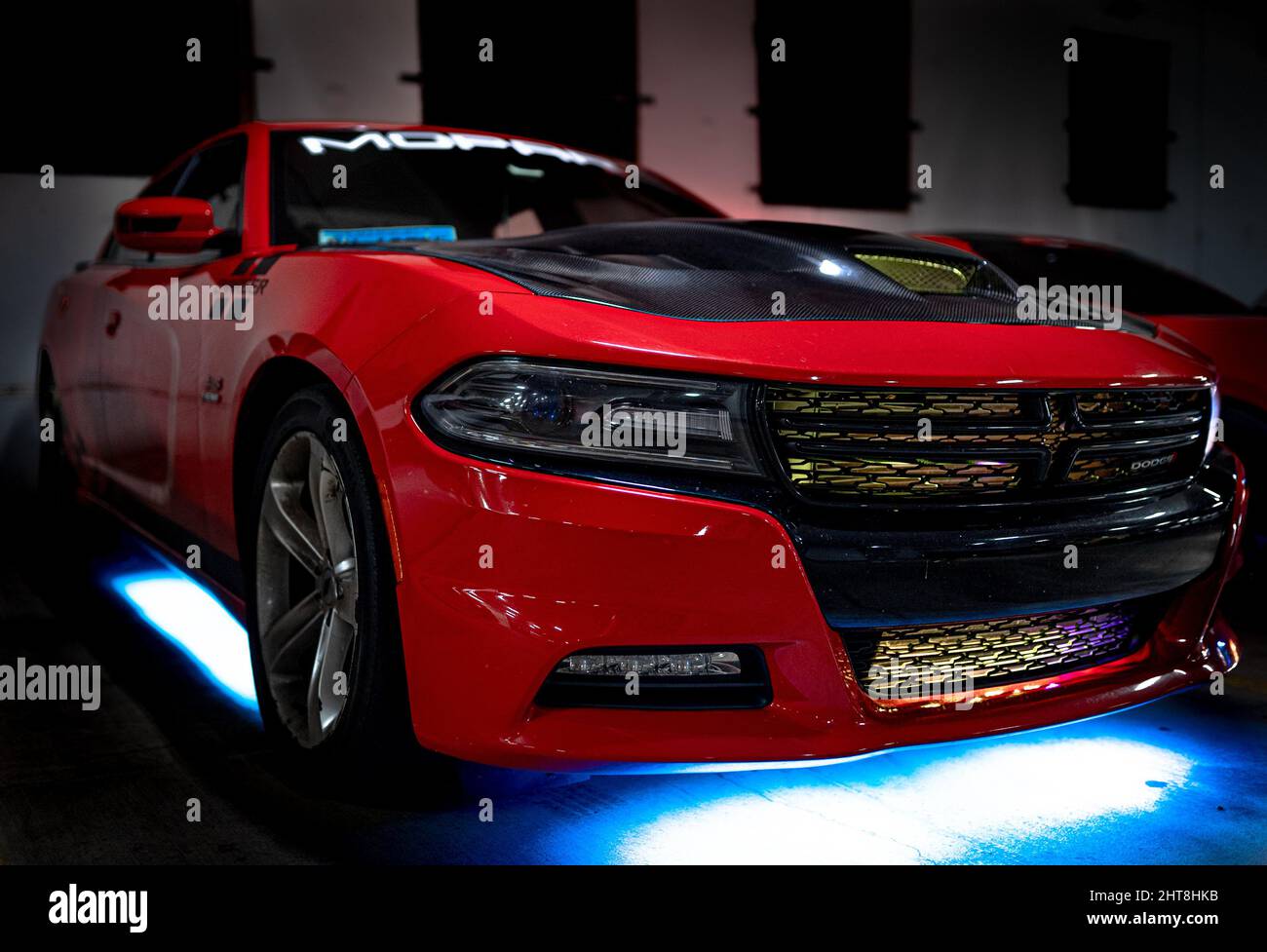 Red sports car at a car show Stock Photo - Alamy