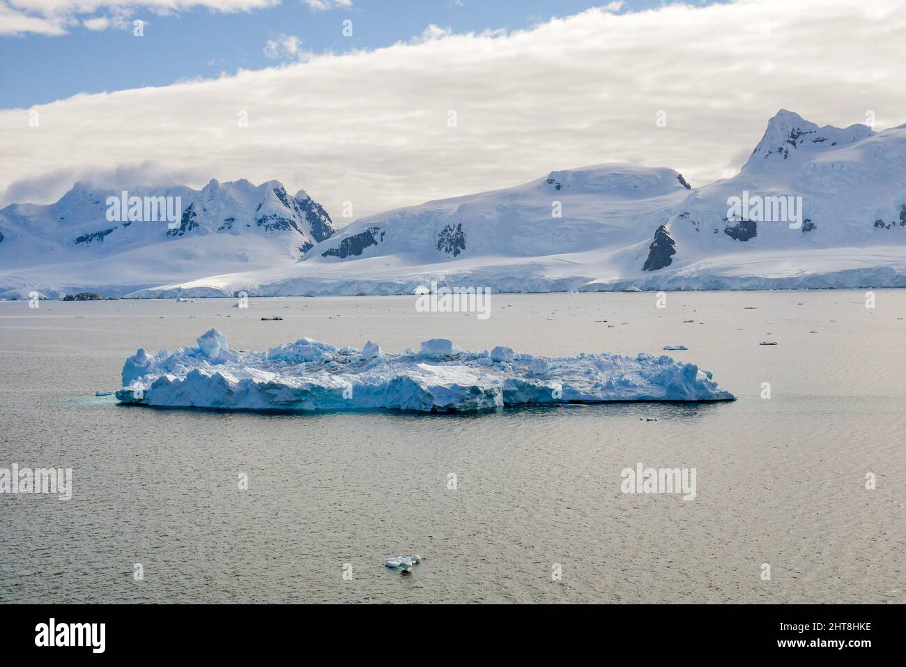 Scenic view of the Paradise Bay covered with icy rocks in Antarctica ...