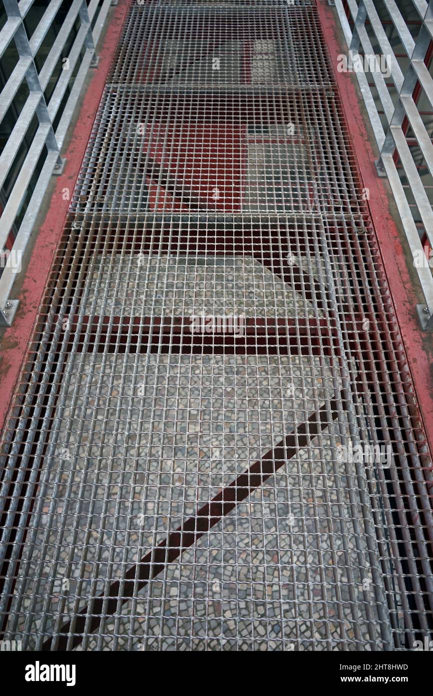 Red bridge with industrial steel flooring Stock Photo - Alamy