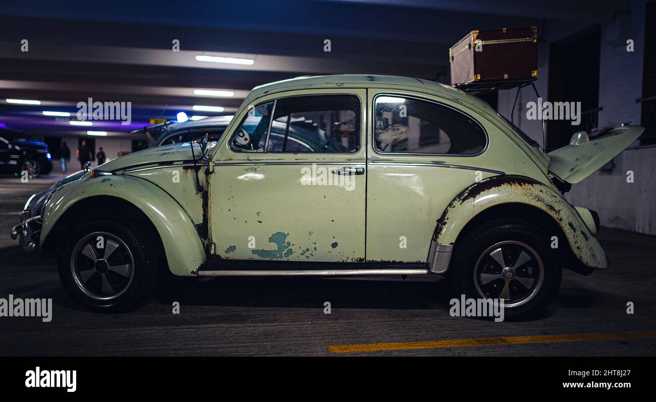 Old yellow retro car at a car show Stock Photo - Alamy