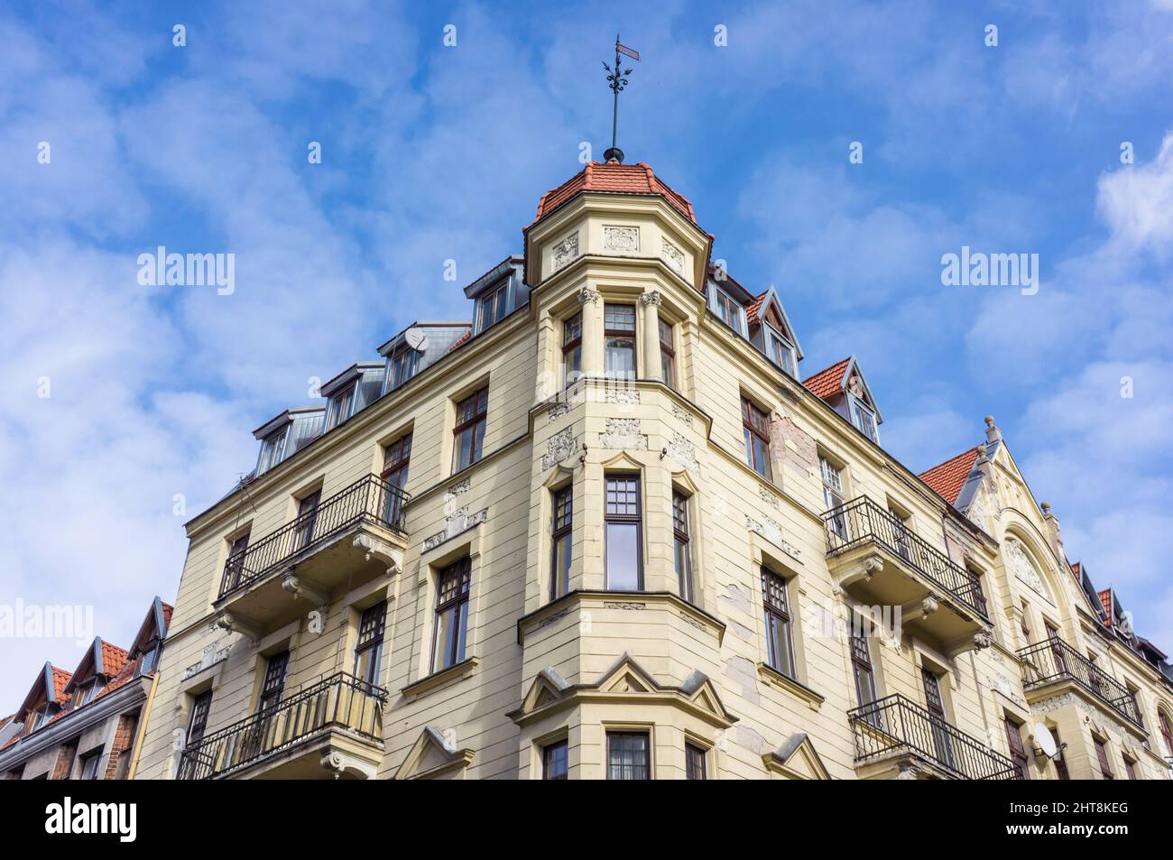 The corner of an old apartment building in the city center. Torun ...
