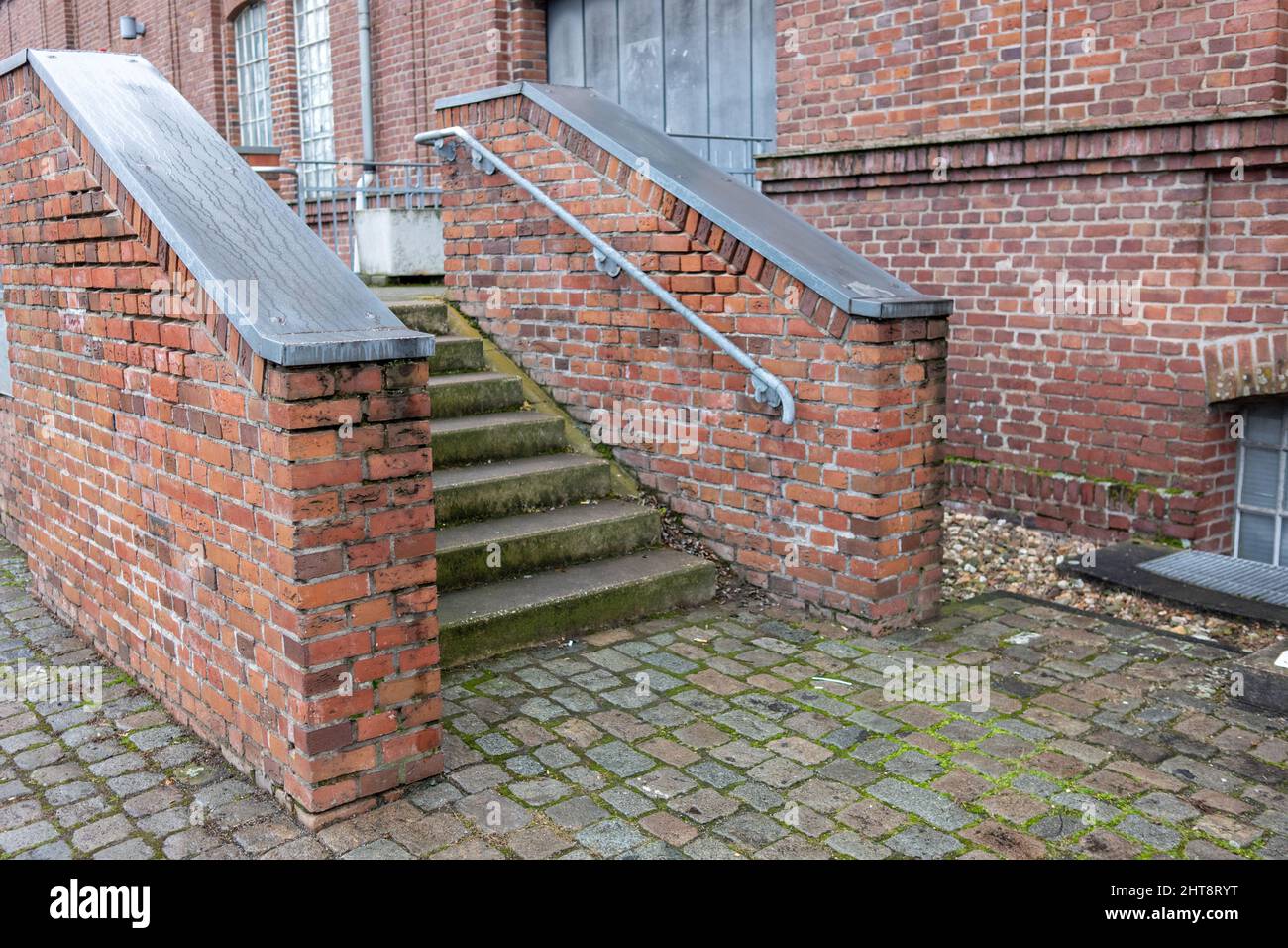 Brick building with a stairway outdoors Stock Photo - Alamy