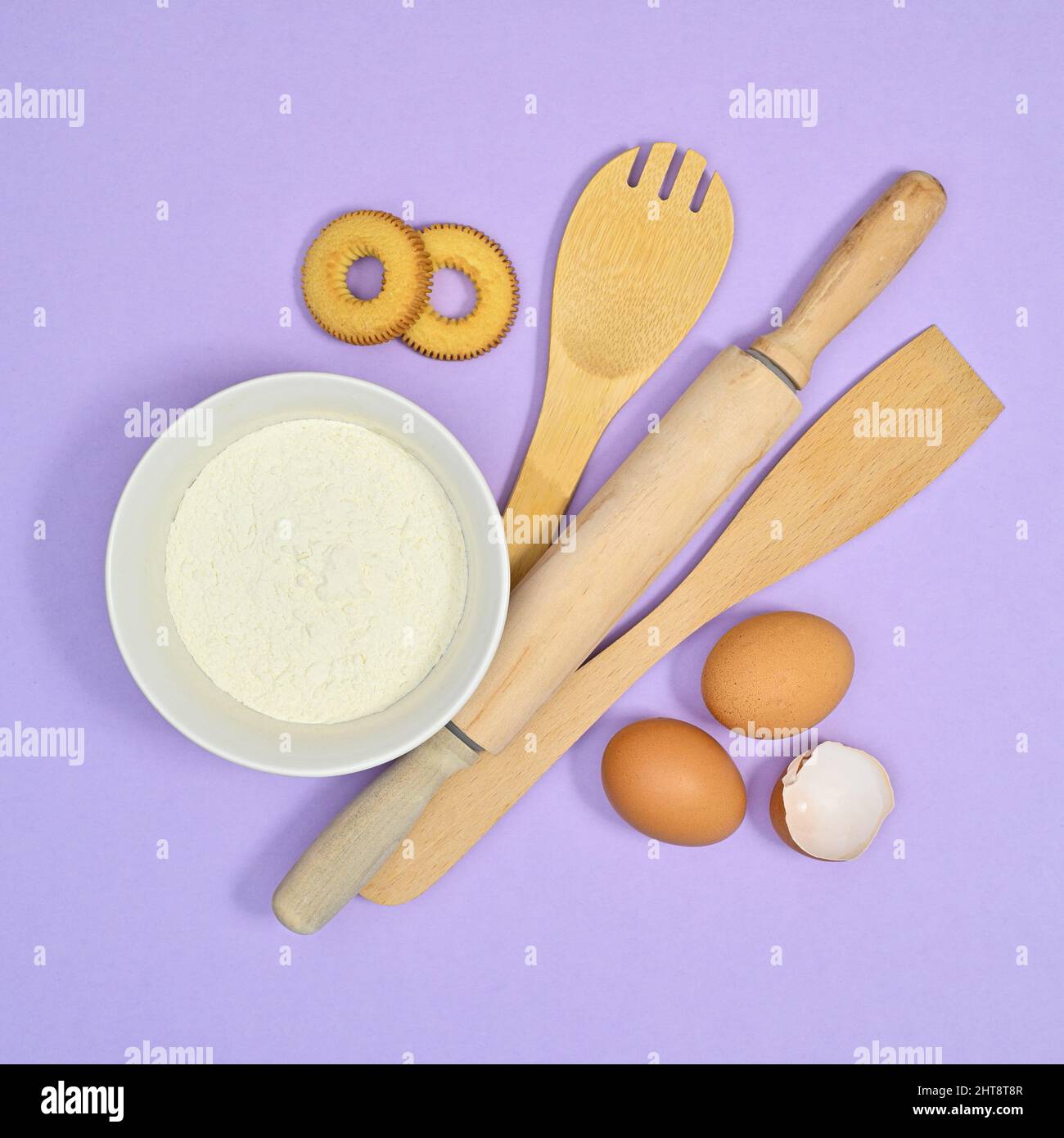 Creative cooking ingredients layout on pastel purple background. Flat ...