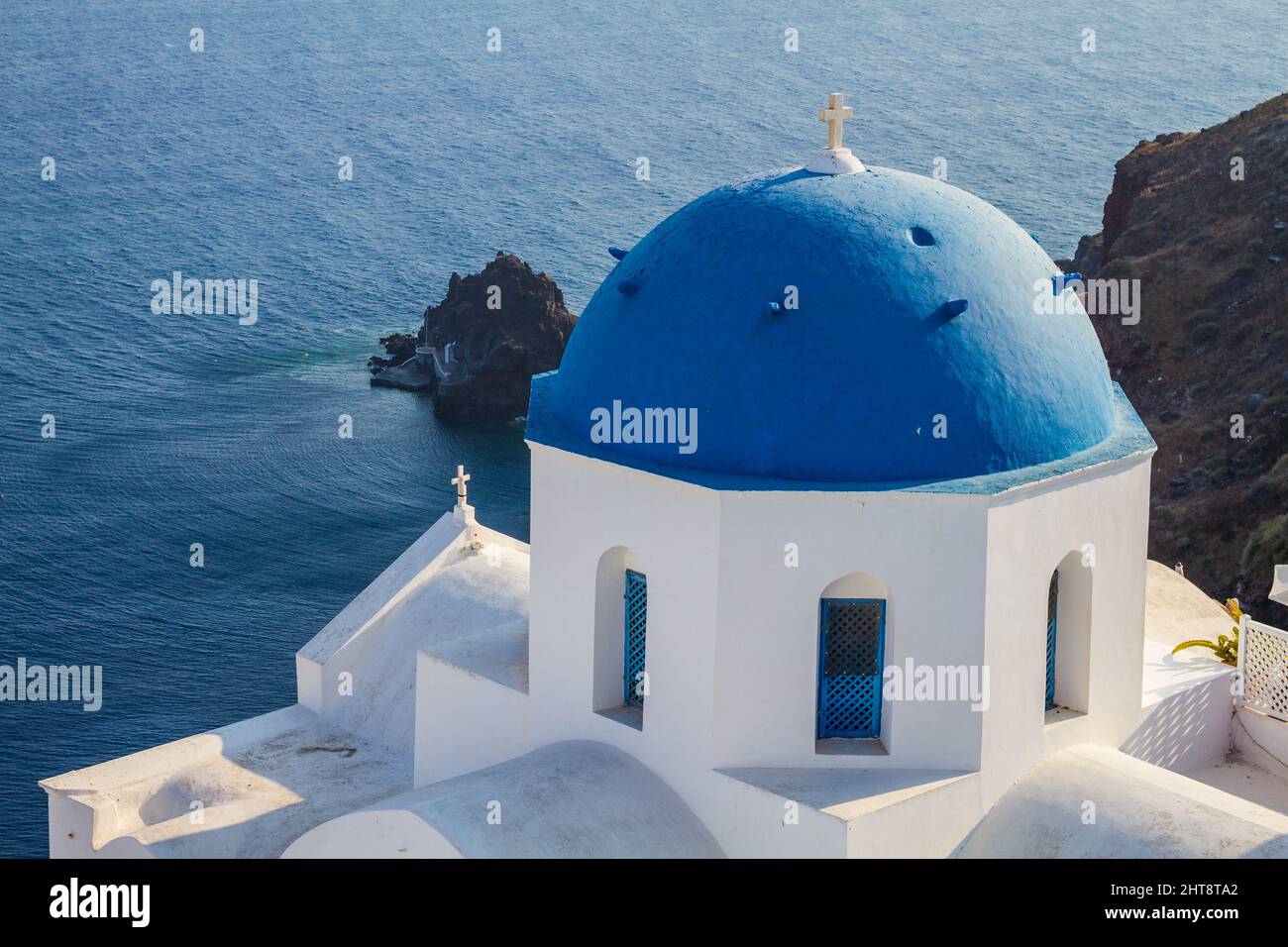 Iconic blue dome church in the island of Santorini in Greece Stock ...