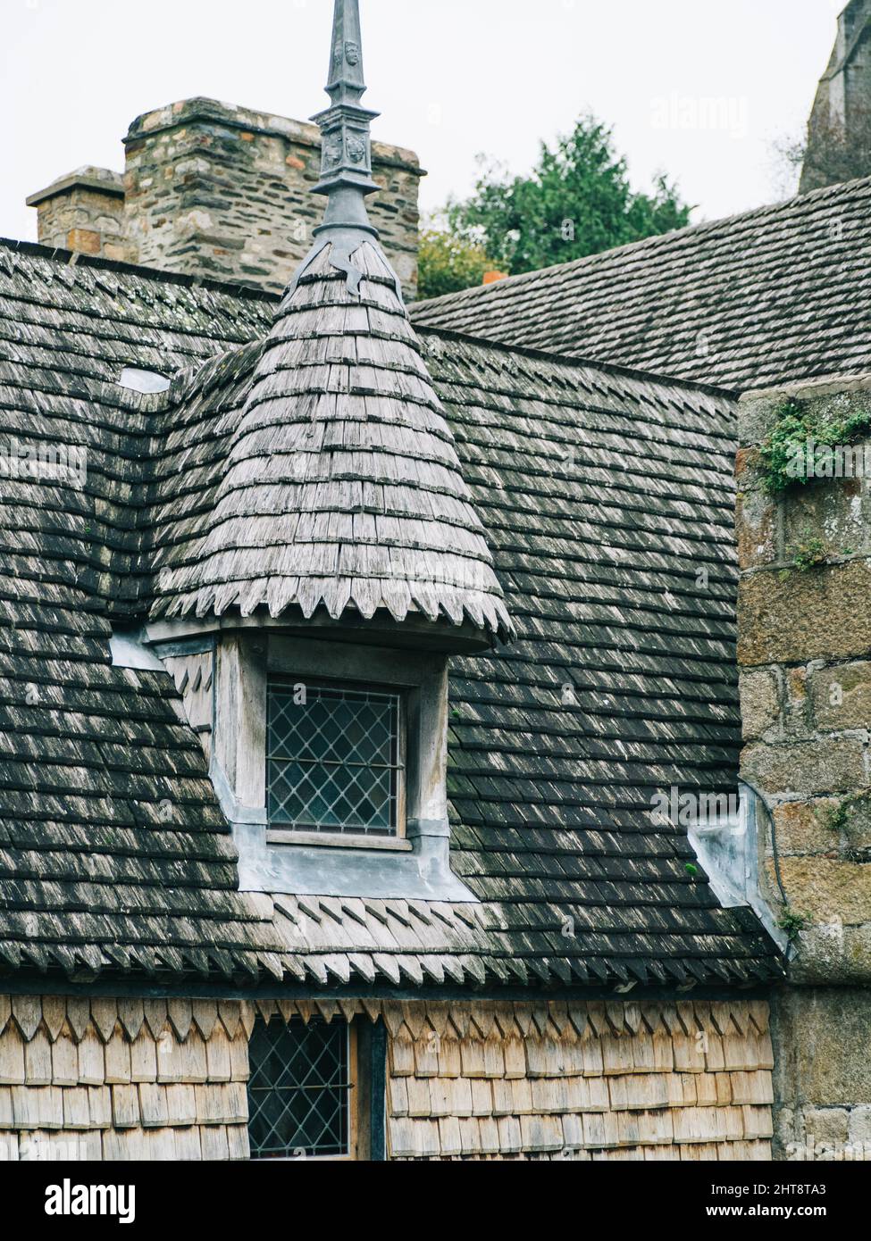Vertical shot of a roof of a building in gothic style Stock Photo - Alamy